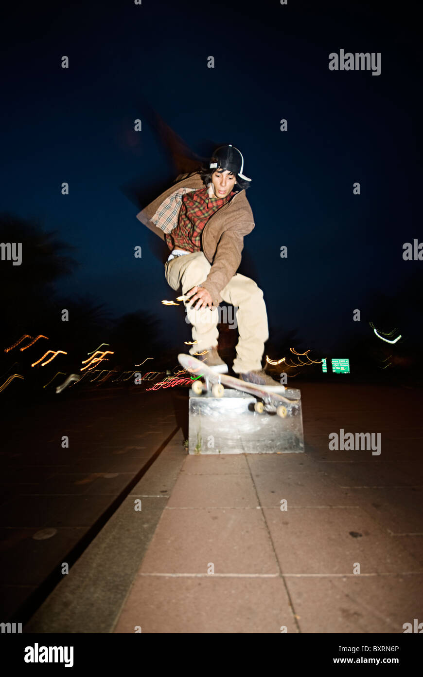 Young guy training skateboarding city hi-res stock photography and ...