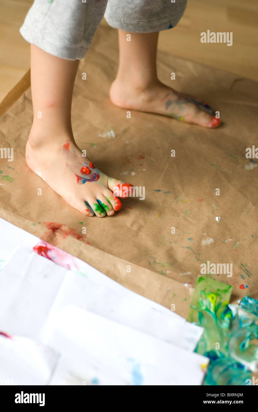 Child feet painting hi-res stock photography and images - Alamy