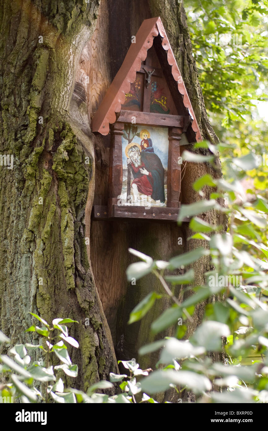 Religious shrine on tree hi-res stock photography and images - Alamy