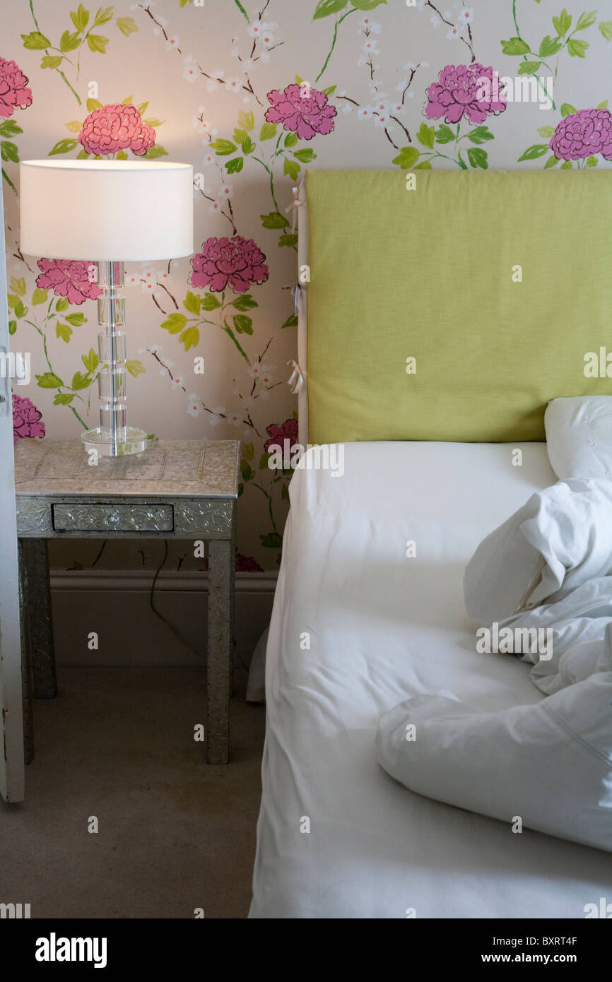 Bedroom with crumpled duvet on bed Stock Photo - Alamy