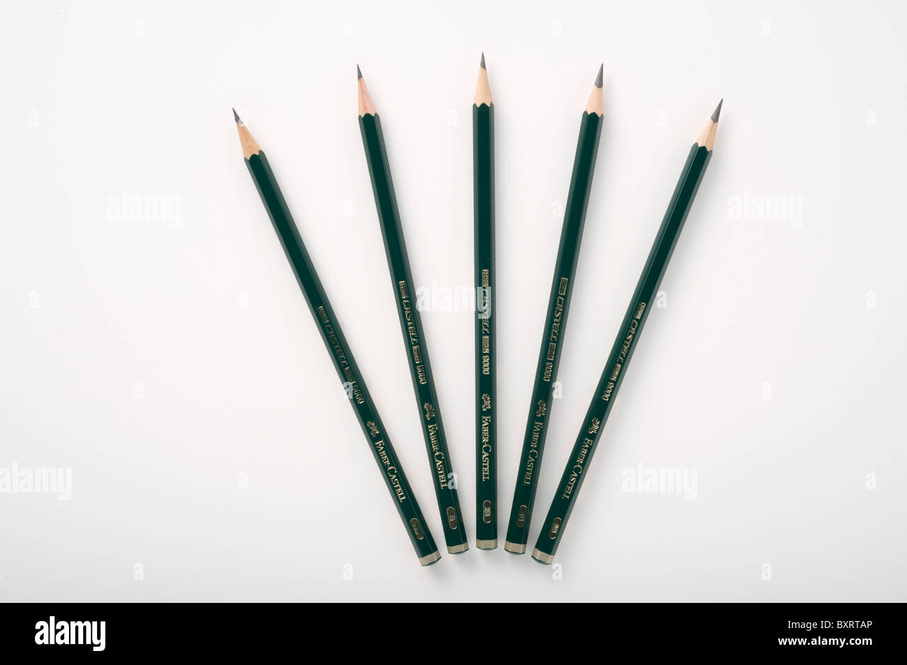 Five sketching pencils on white background Stock Photo - Alamy