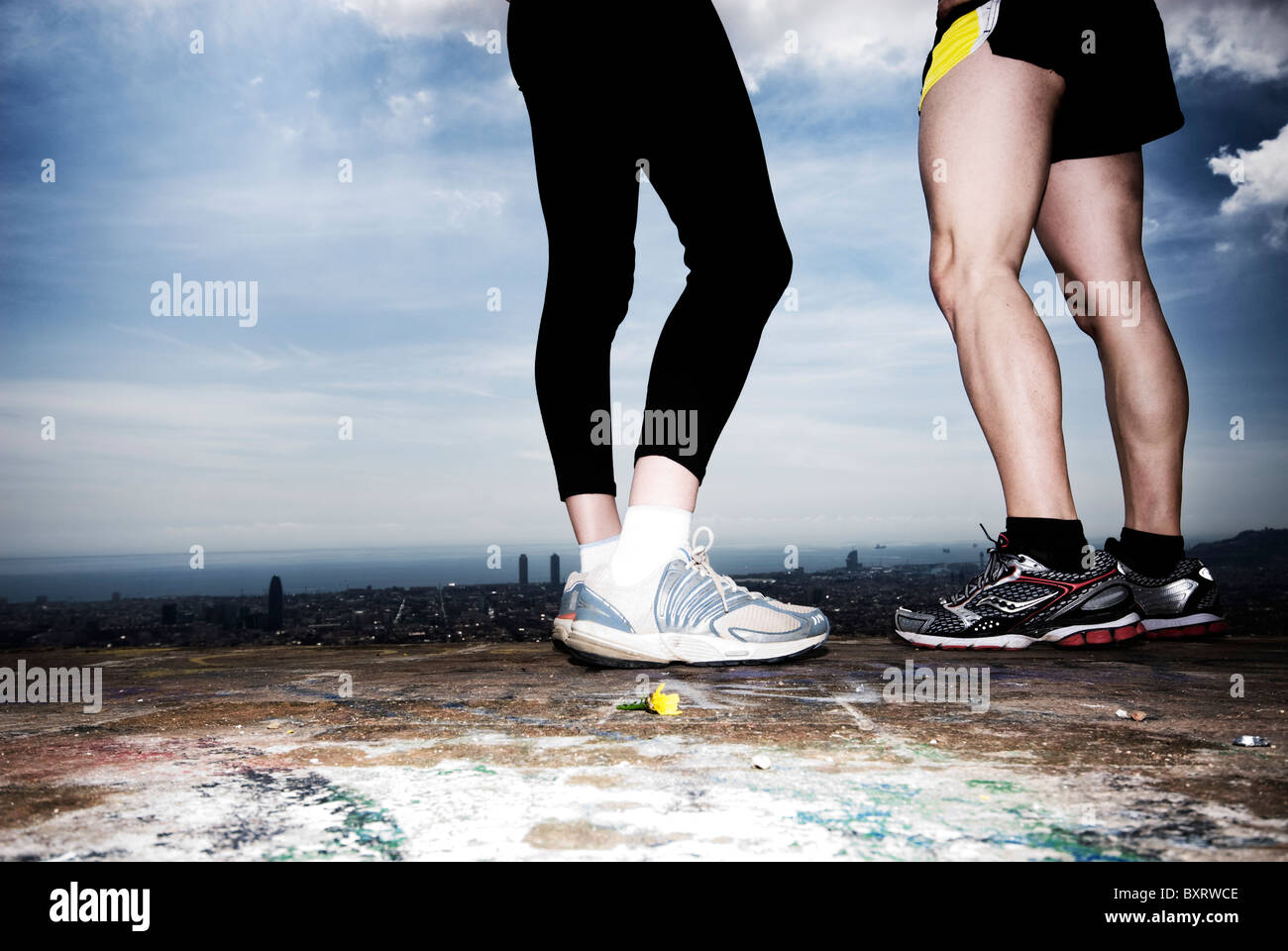 couple of men and woman taking a break after train with great views ...
