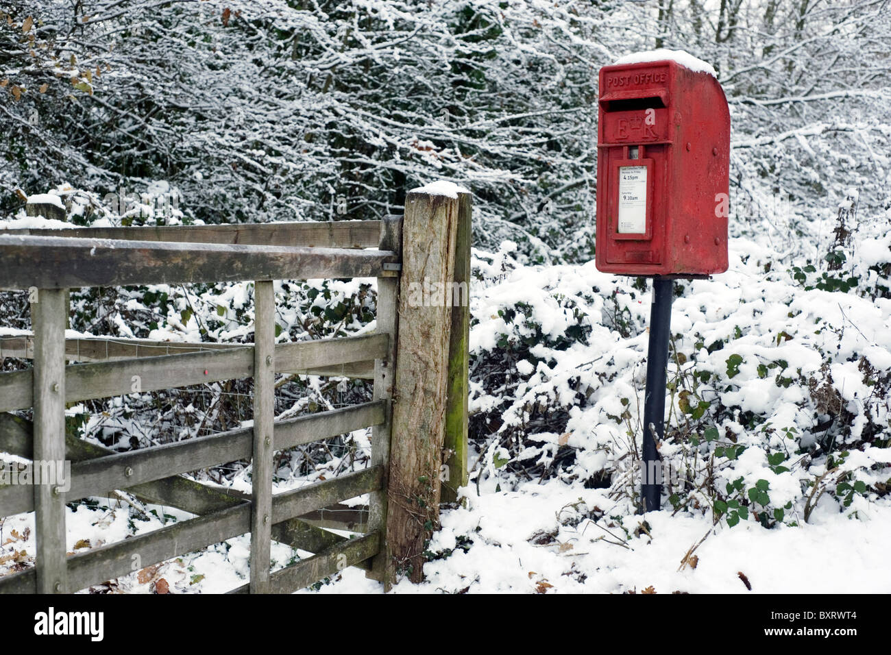 traditional red rural post box covered in snow Stock Photo - Alamy