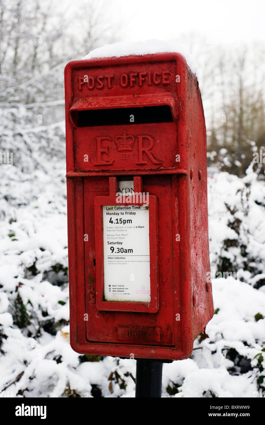 traditional red rural post box covered in snow Stock Photo - Alamy