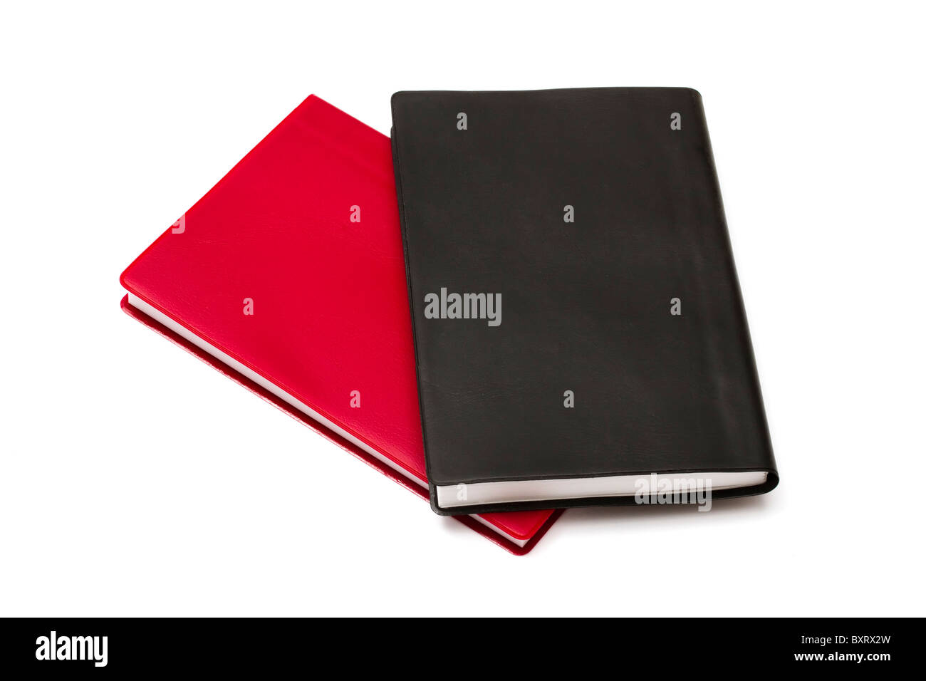 Red and black notebooks isolated on white background Stock Photo - Alamy