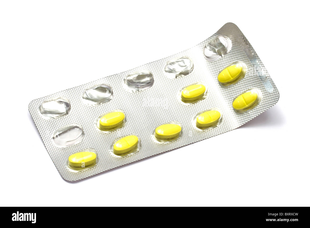 Package of Yellow Pills isolated on white background Stock Photo - Alamy