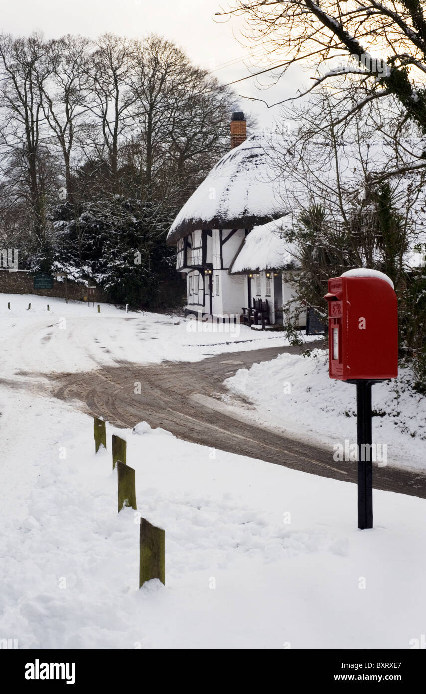 traditional thatched pub in the snow the red lion chalton hampshire ...