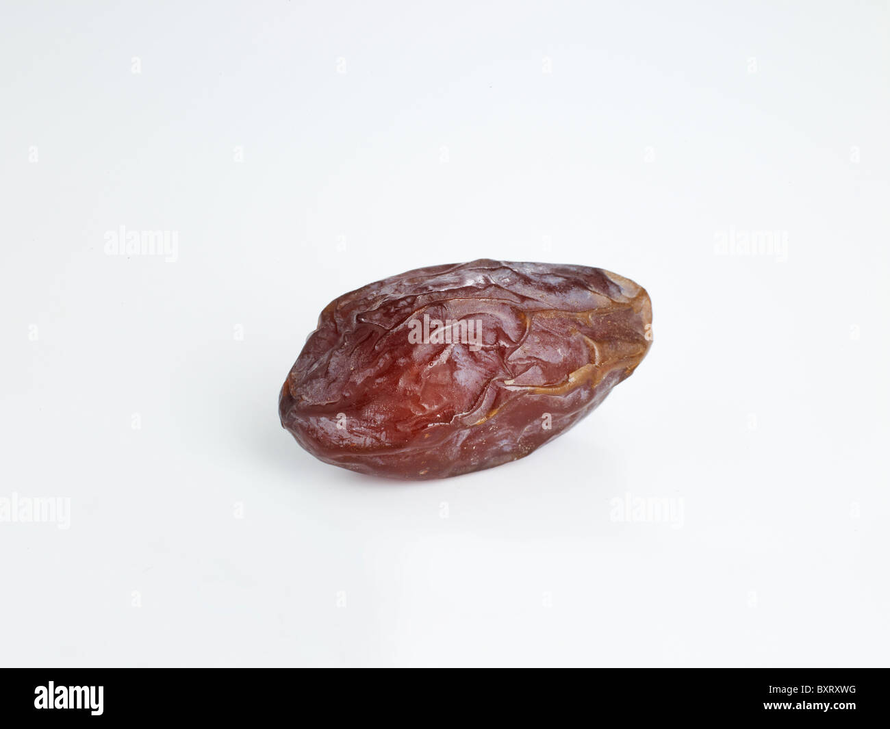 Medjool Dates on white background Stock Photo - Alamy