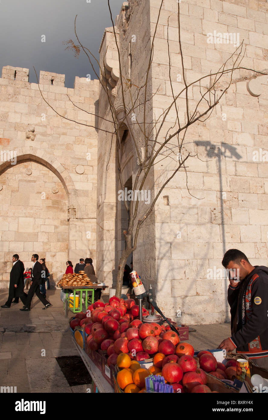 Palestinian hawcker selling pomgrenade juice at jaffa Gate. Jerusalem ...