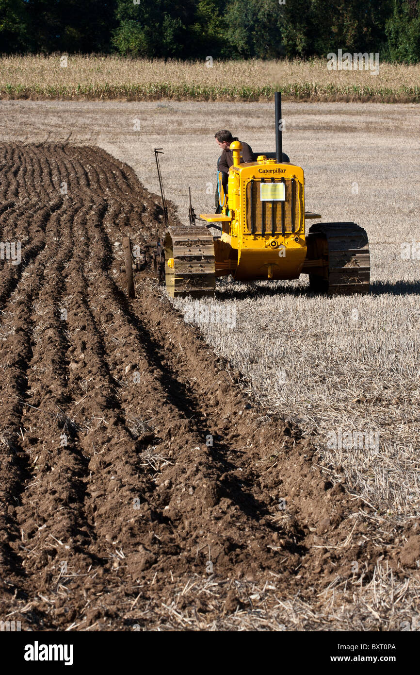 Farmer using a Tractor to plough a field in a ploughing match, UK Stock ...