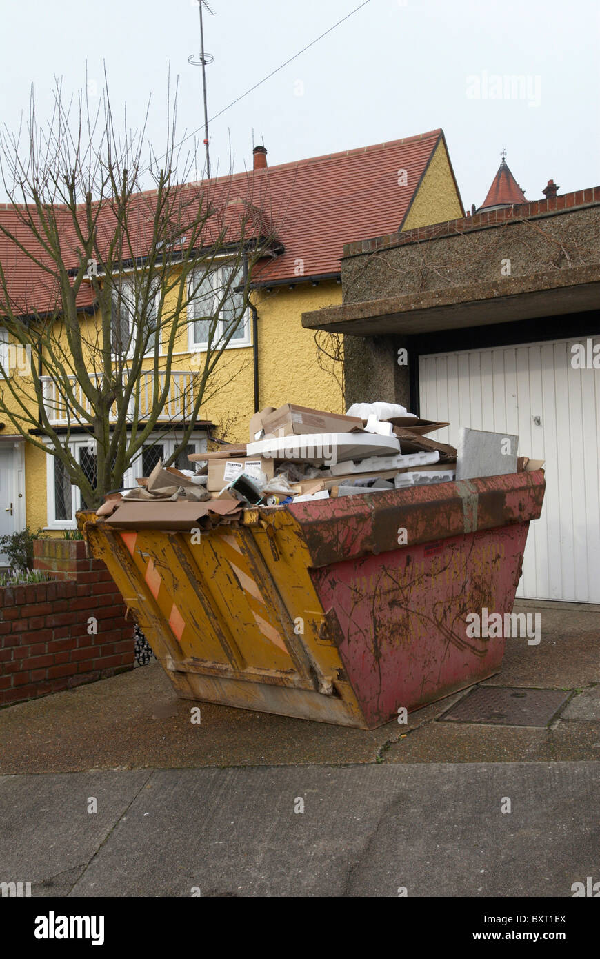 Skip in driveway hi-res stock photography and images - Alamy