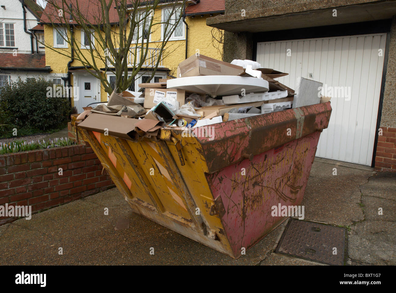 Skip in driveway hi-res stock photography and images - Alamy