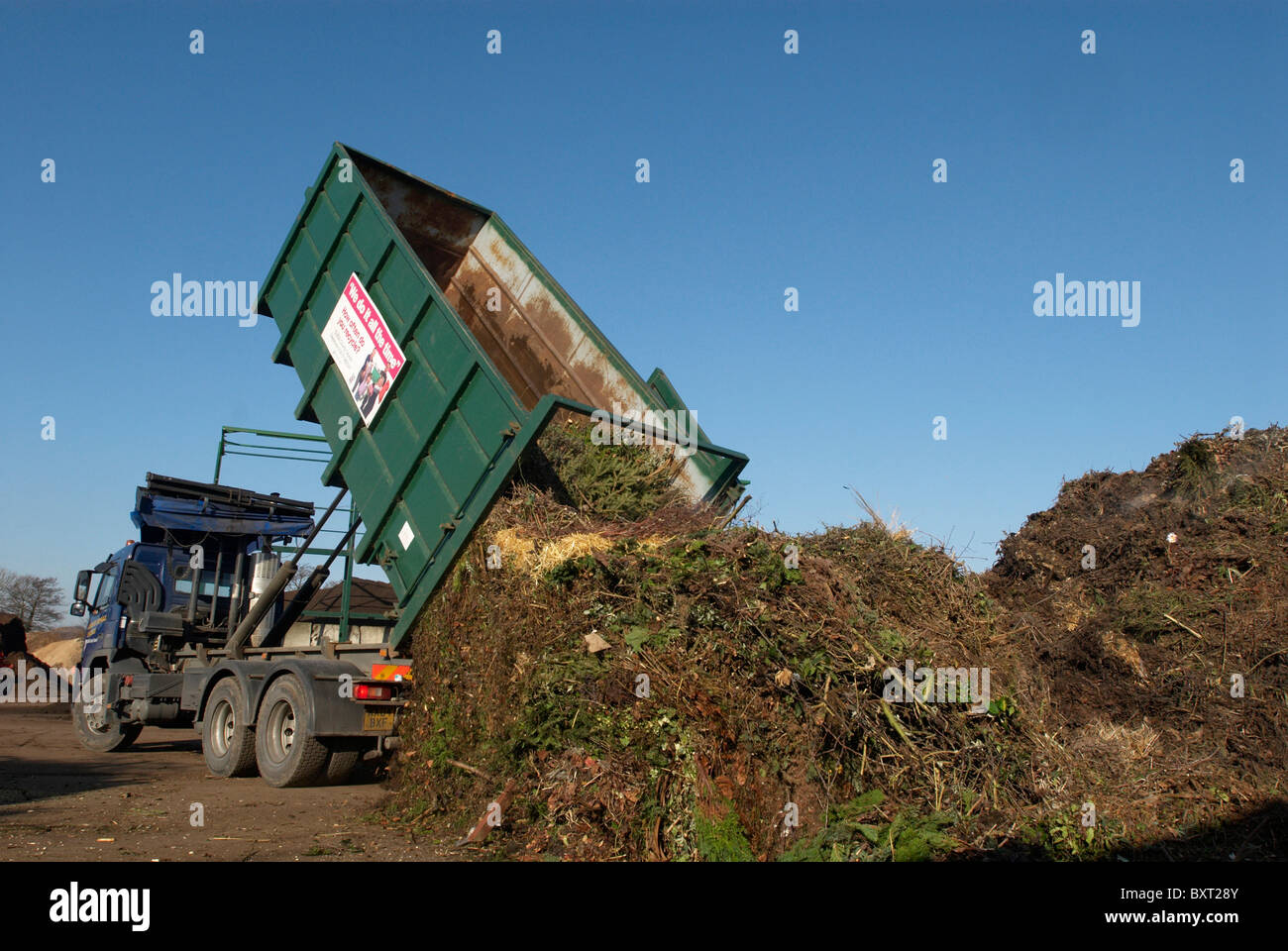Recycling lorry unloading green waste hi-res stock photography and ...