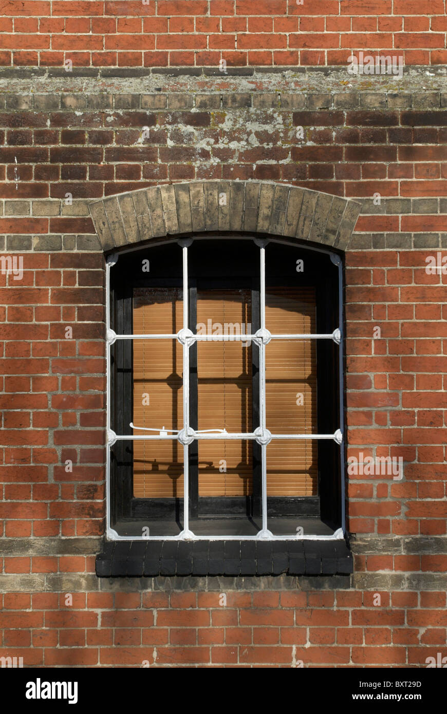 Detail of window on brick building Stock Photo - Alamy