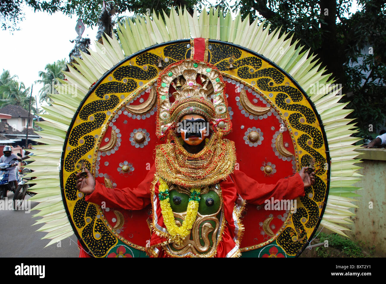 traditional theyyam dancer with colourful costumes from a festival in ...