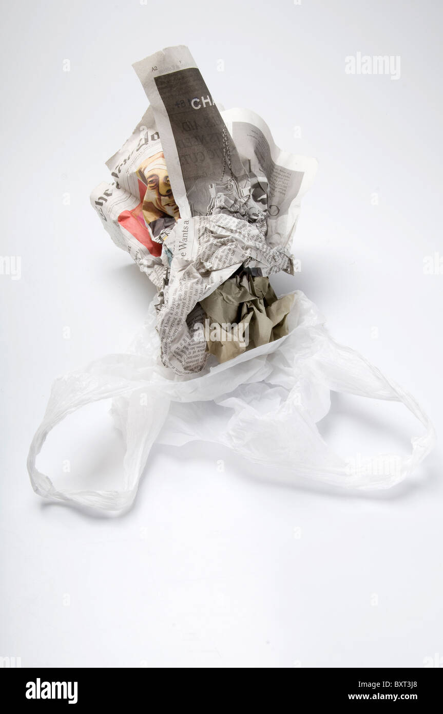 Newspaper and plastic bag for recycling Stock Photo - Alamy