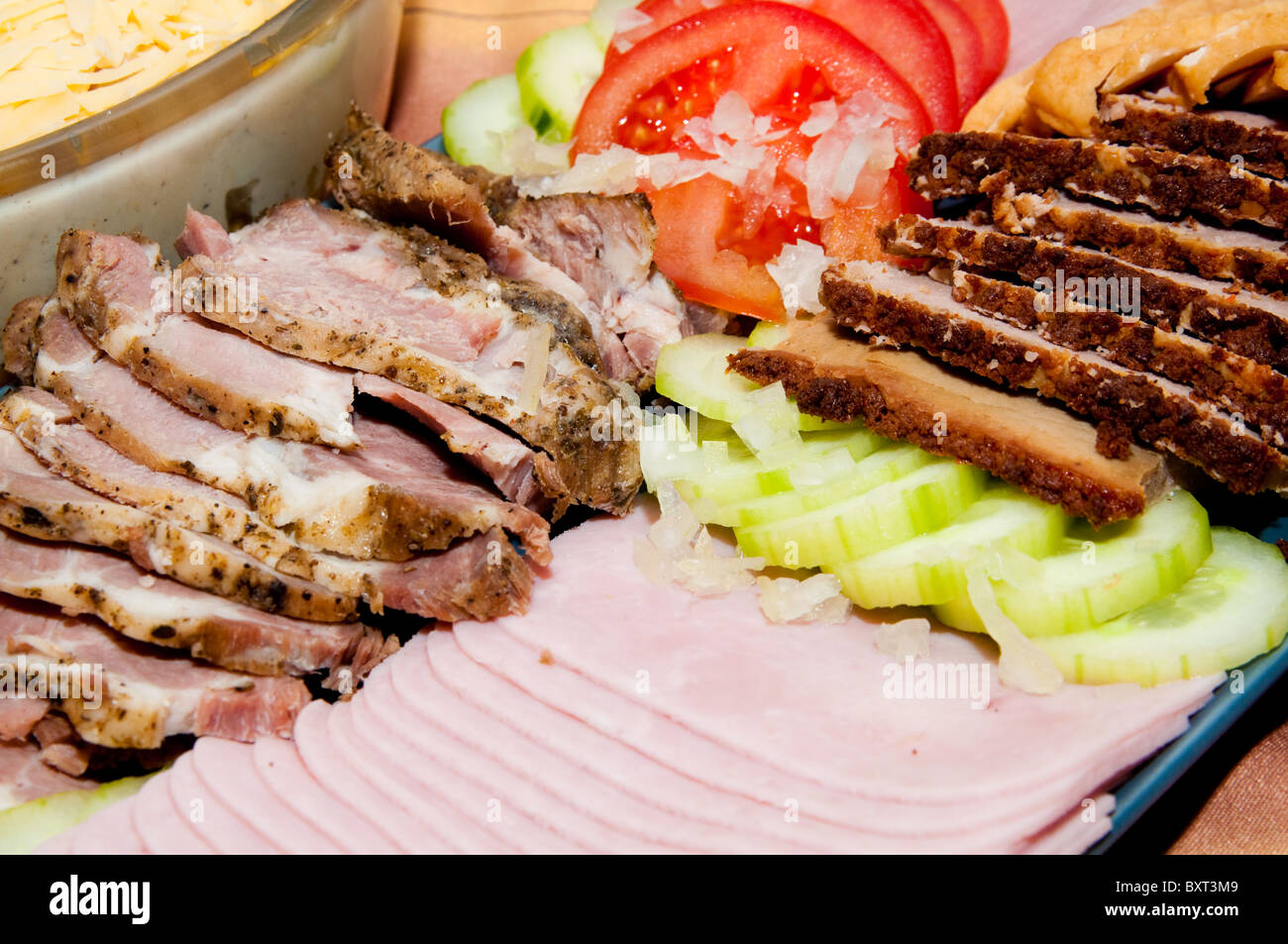 cold meat with tomatoes Stock Photo - Alamy