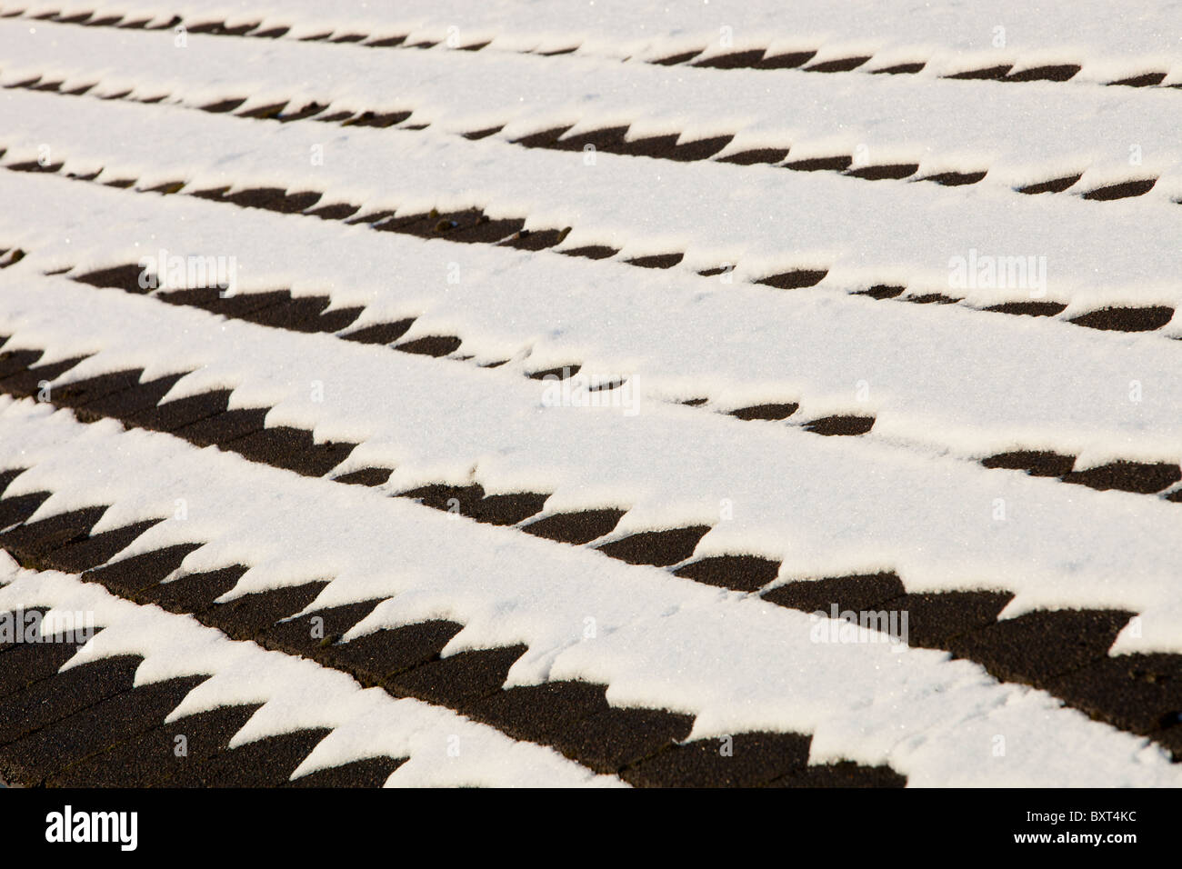 Melting roof snow hi-res stock photography and images - Alamy