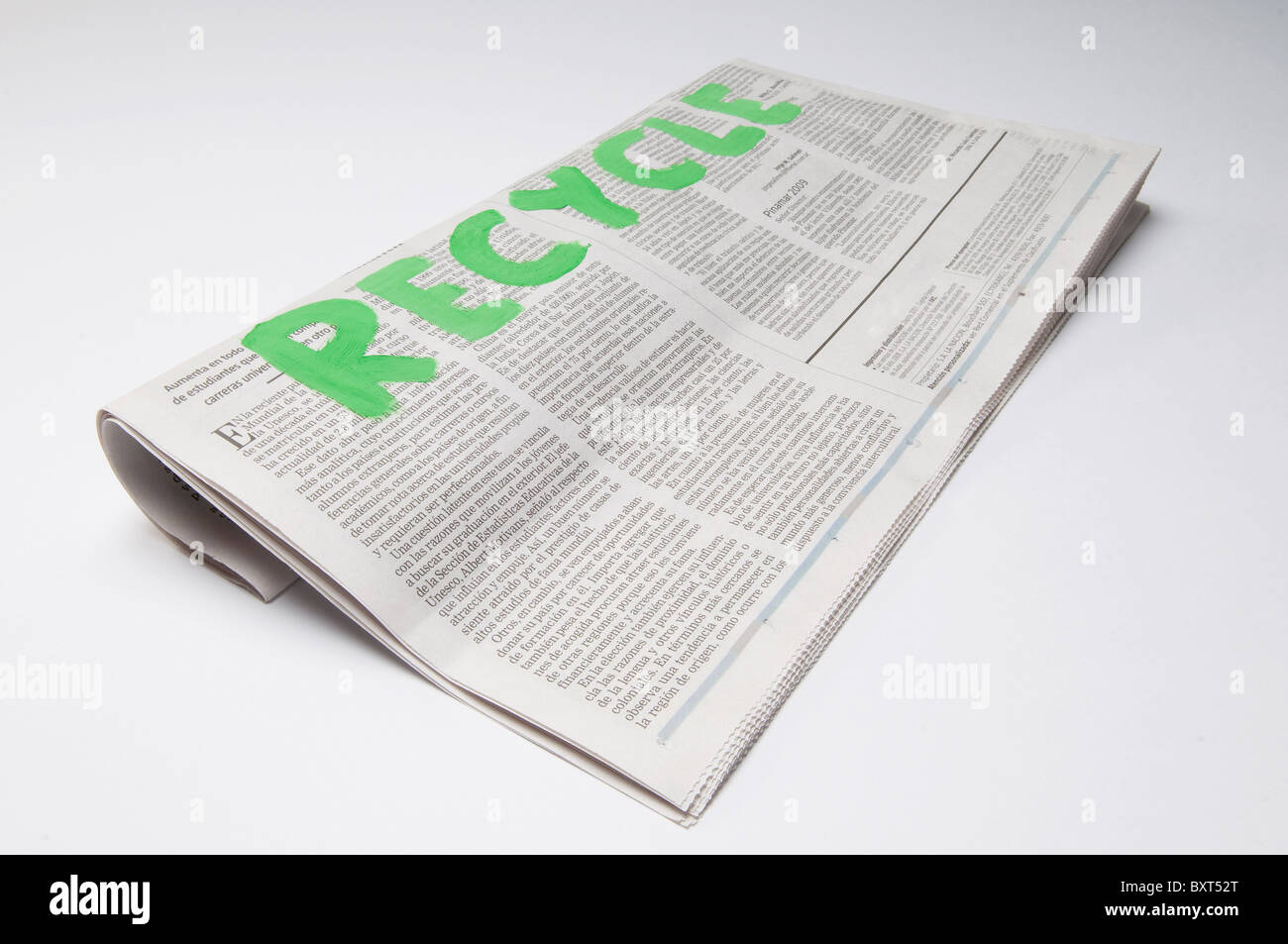 Recycle painted on newspaper Stock Photo - Alamy