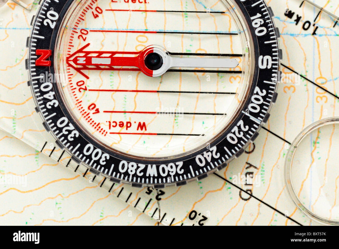 Compass on map Stock Photo - Alamy