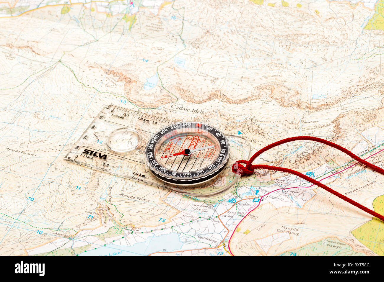 Compass lying on an OS map Stock Photo - Alamy
