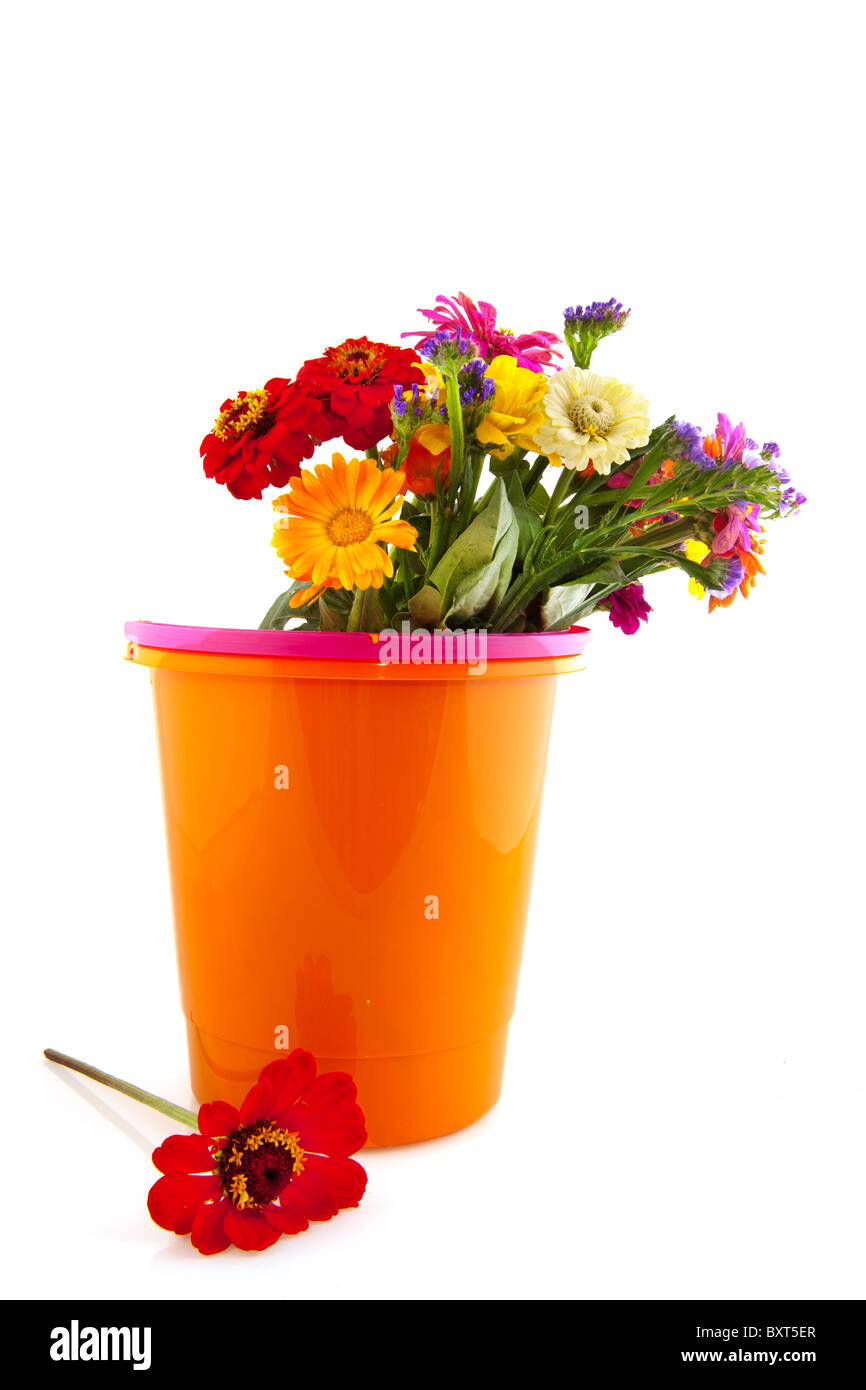 colorful flower bouquet in plastic orange bucket Stock Photo - Alamy