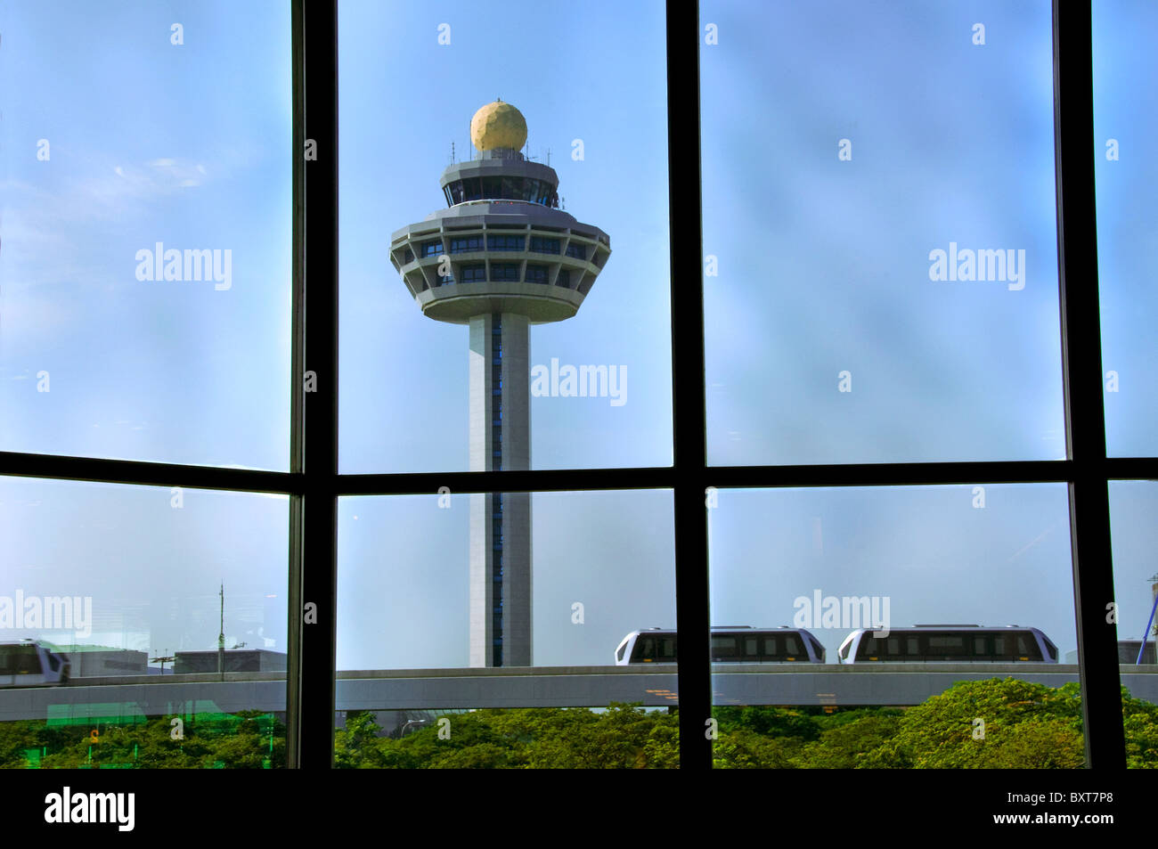 Flight control tower at new modern airport terminal in Singapore ...