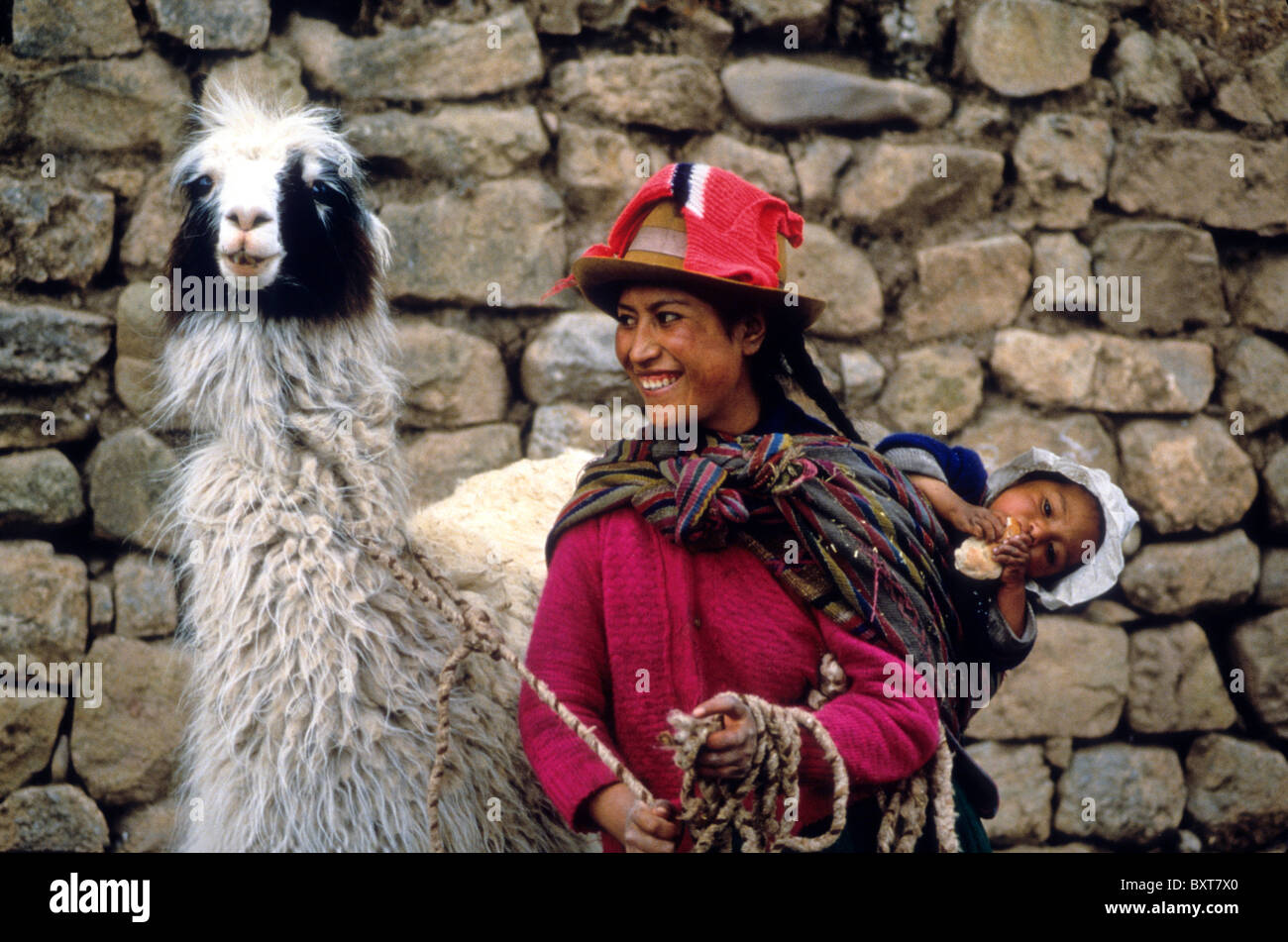 Indian woman with llama and child hi-res stock photography and images ...