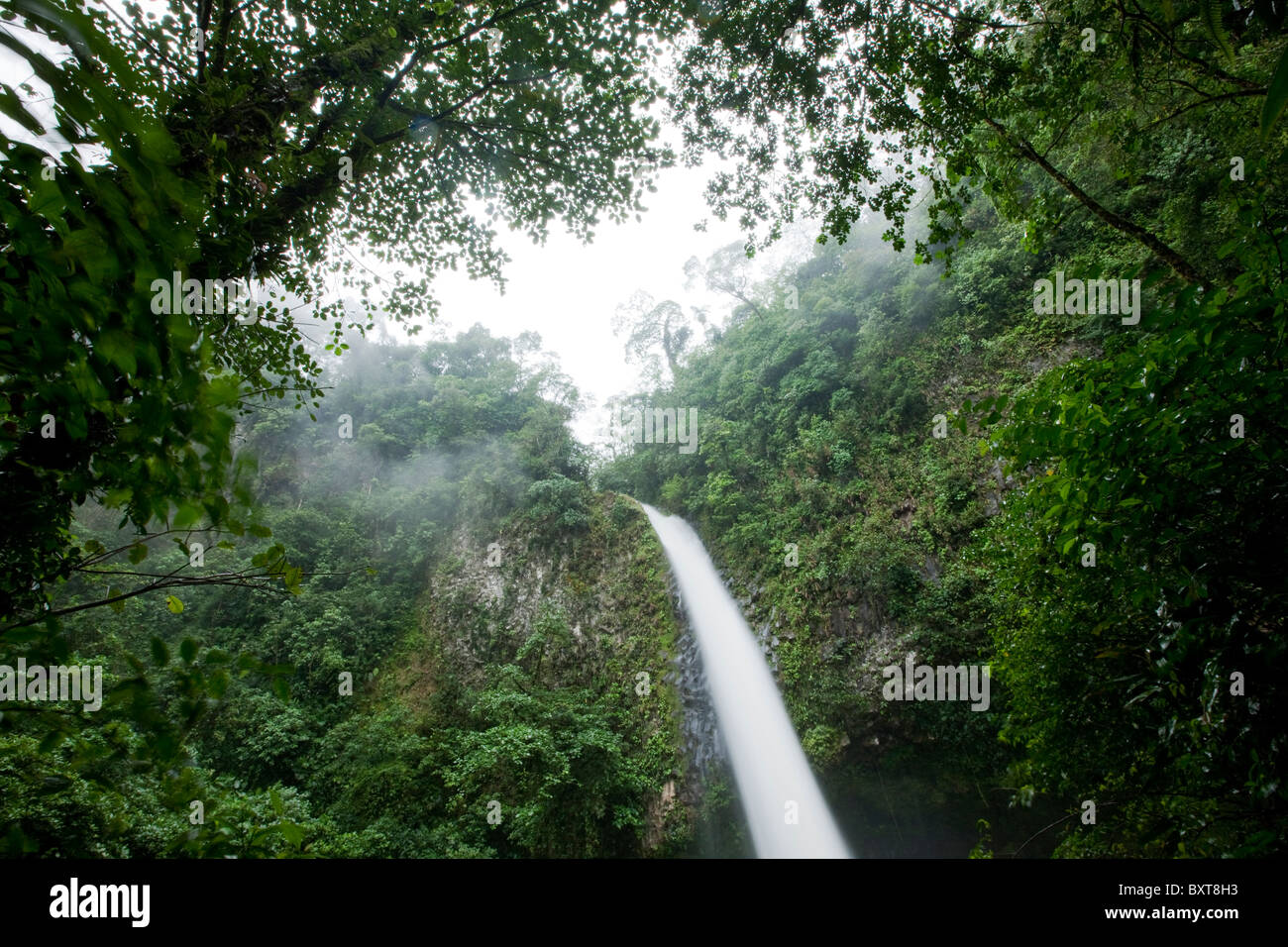 Costa Rica, La Fortuna, Waterfall in rainforest along Fortuna River ...