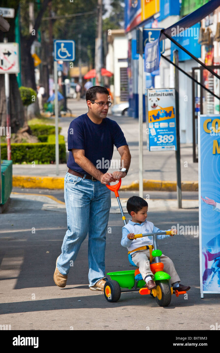 Young Mexican father and son in Coyoacan, Mexico City, Mexico Stock ...