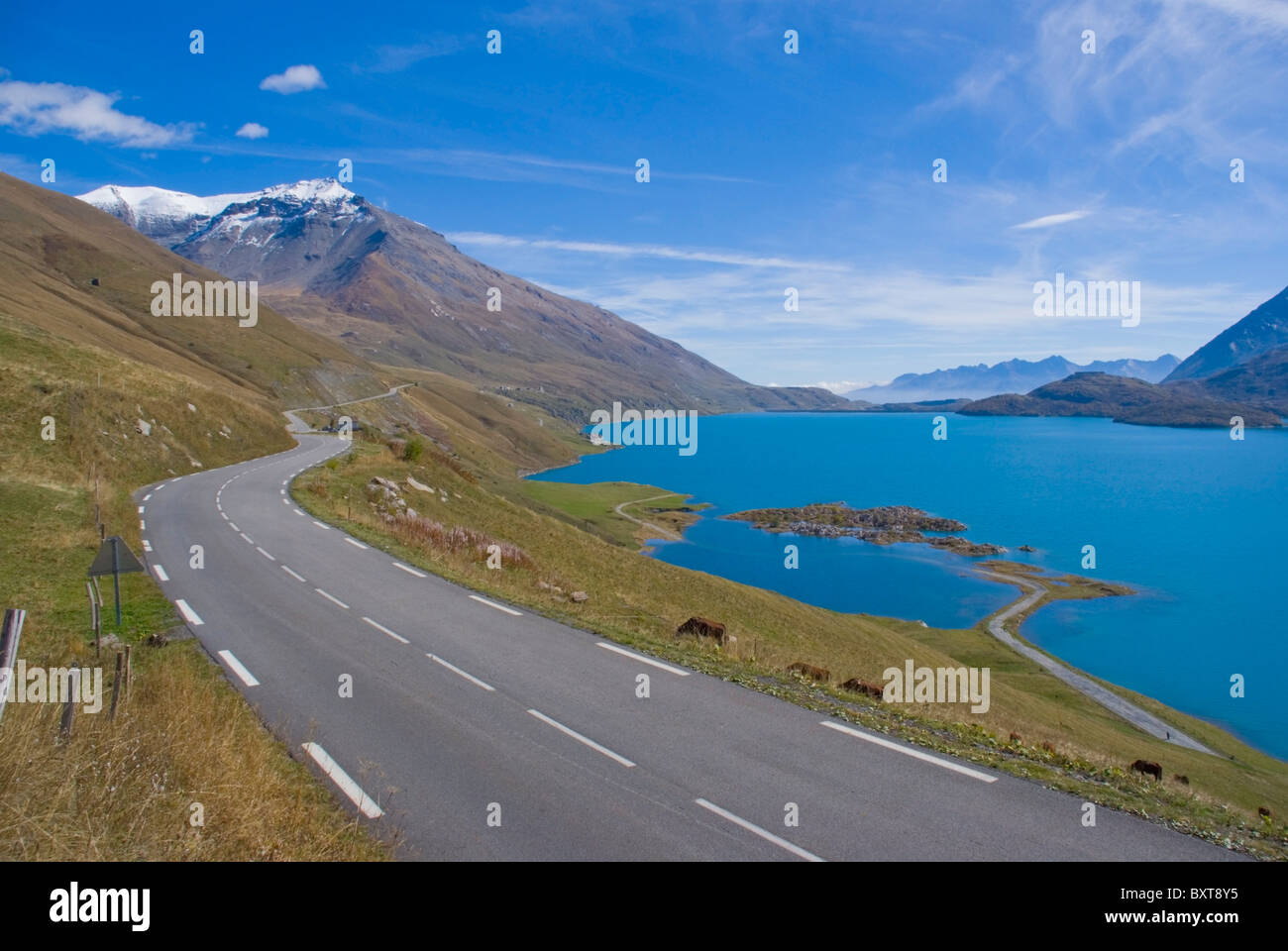 Empty Bendy Road By Lake And Mont Cenis Stock Photo - Alamy