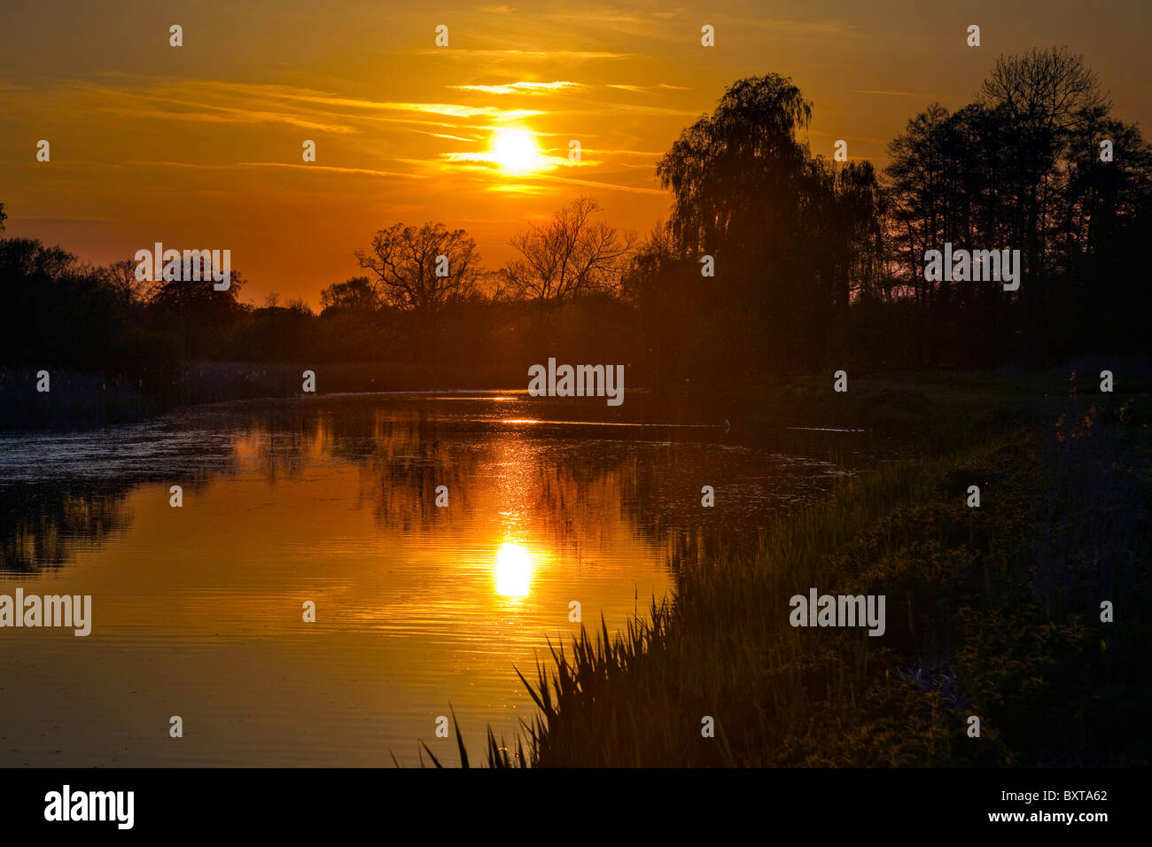Reflections of a sunset hi-res stock photography and images - Alamy