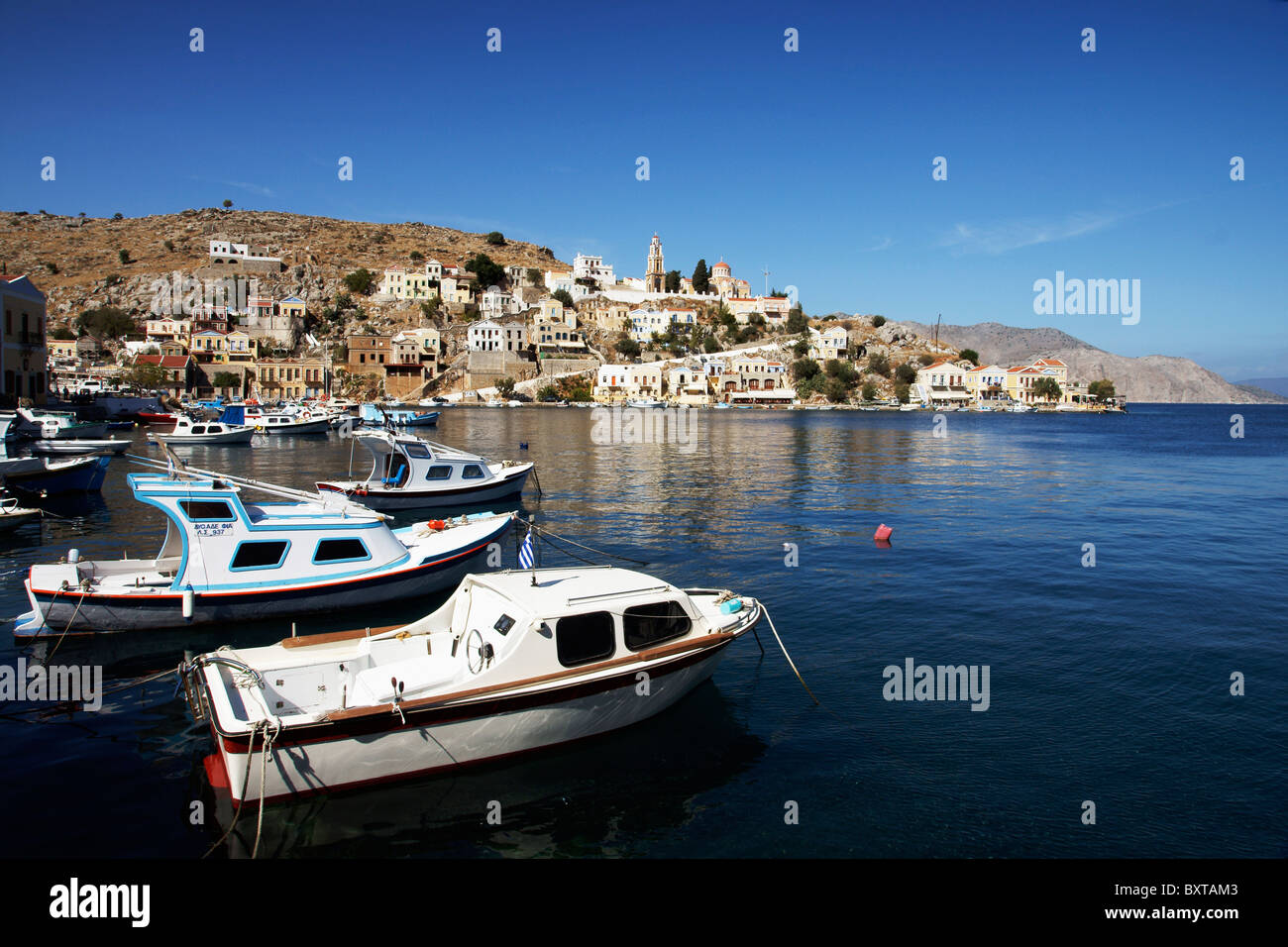 Harbour Of Symi Town On Island Of Symi Stock Photo - Alamy
