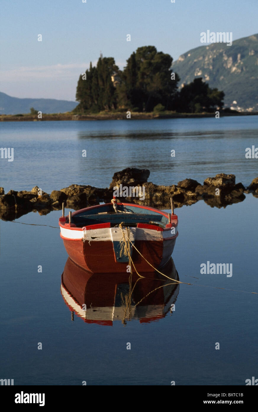 Single Boat On Estuary Stock Photo - Alamy