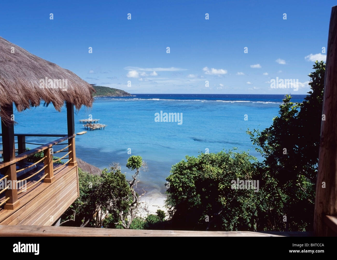 Thatched Roof Over Balcony Overlooking Sea Stock Photo - Alamy