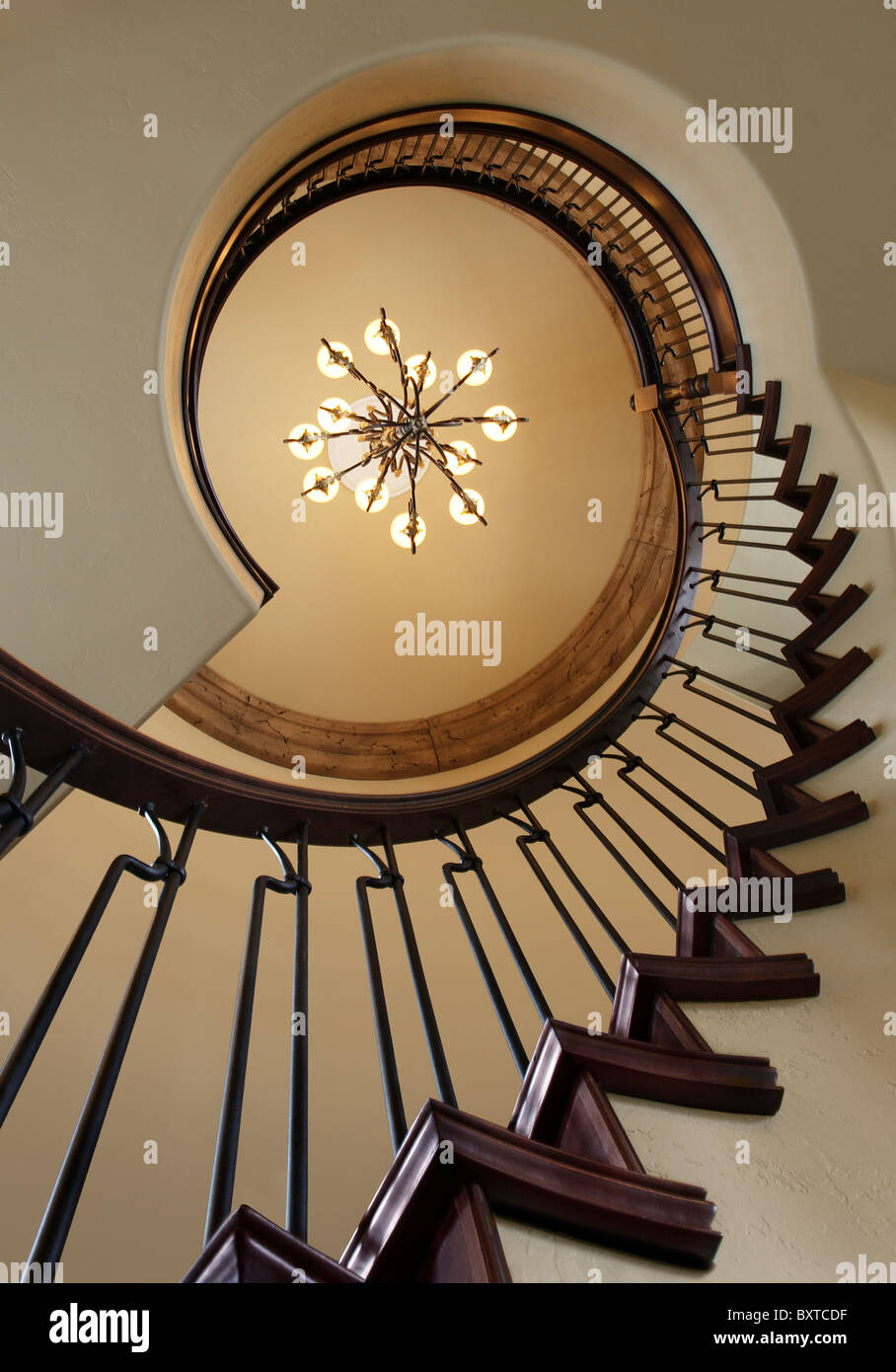 A spiral staircase in an upscale modern residence. This staircase is ...