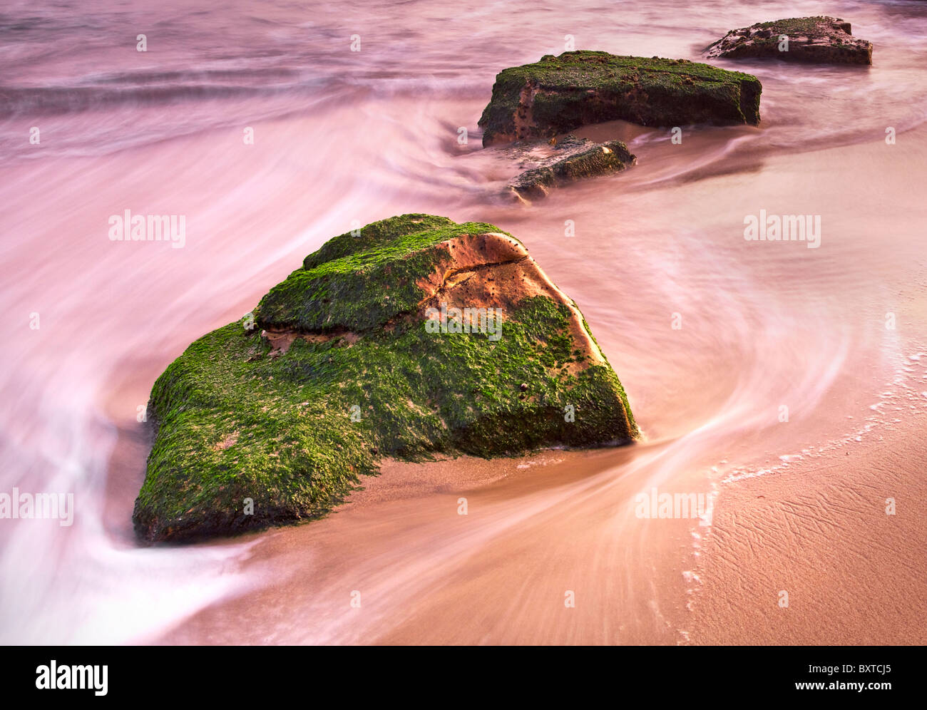 Beautiful Rocks with silky water Stock Photo - Alamy