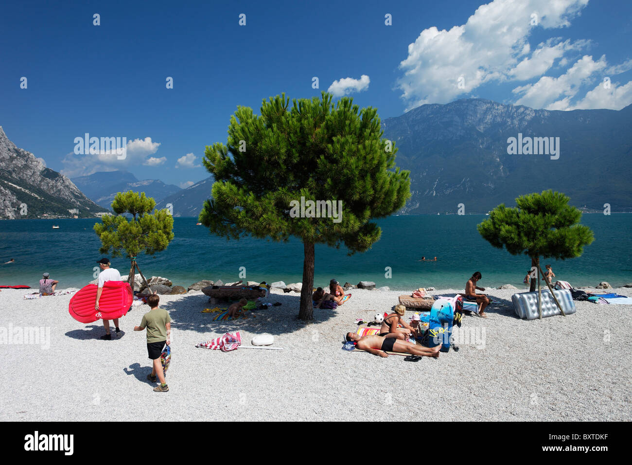 Italian woman sunbathing on beach hi-res stock photography and images ...