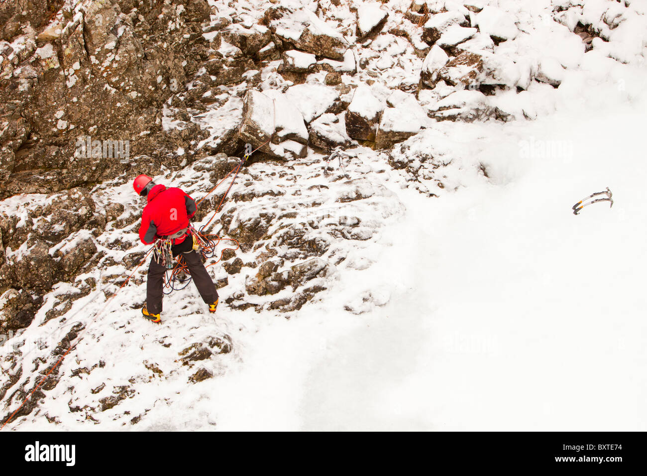 A climber on Fisher Place Ghyll above Thirlmere in the Lake District ...