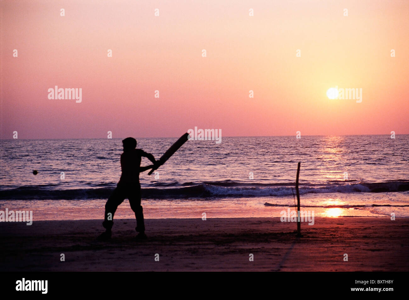 Indian men playing cricket hi-res stock photography and images - Alamy