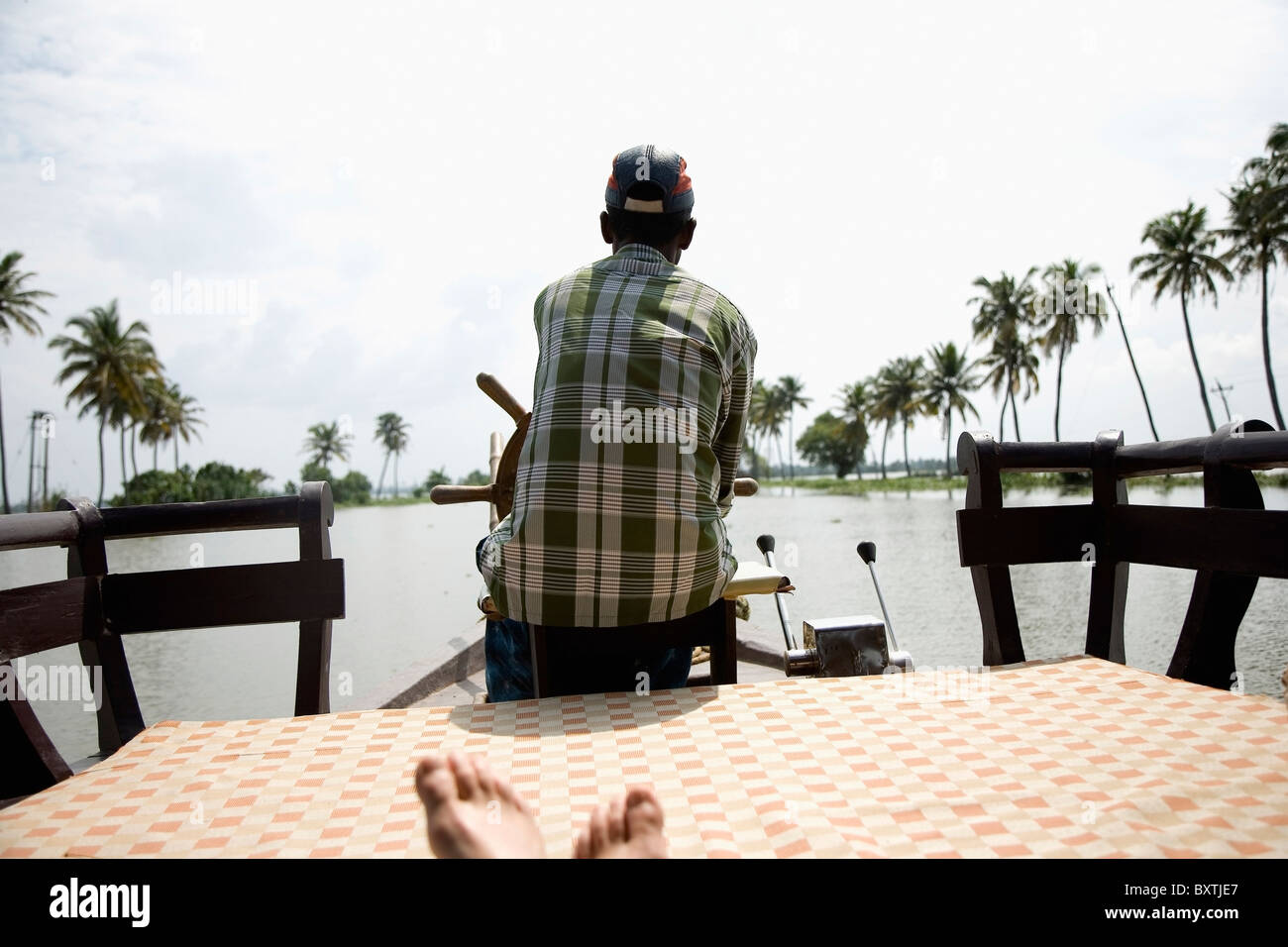 Man riding boat hi-res stock photography and images - Alamy