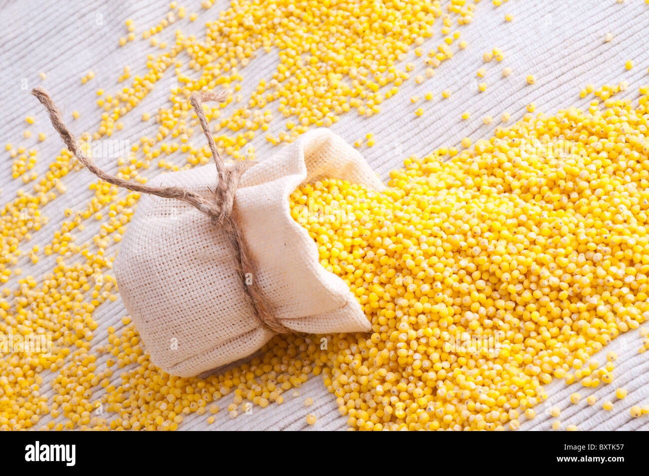 raw Millet in small sack Stock Photo - Alamy