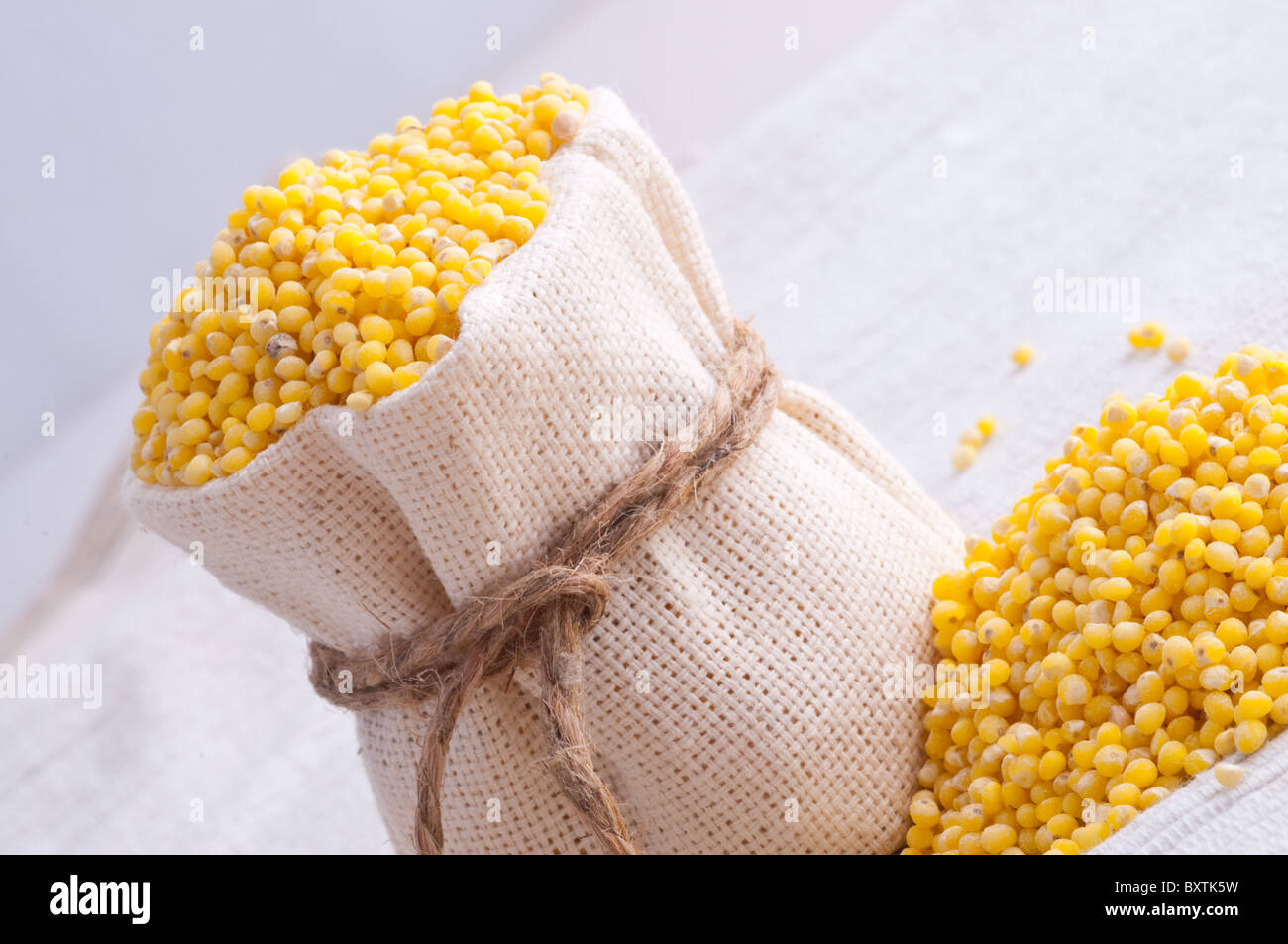 raw Millet in small sack Stock Photo - Alamy