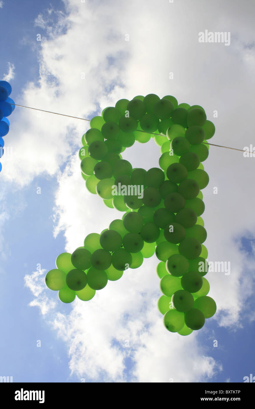 letter r formed with green balloons and blue sky Stock Photo - Alamy