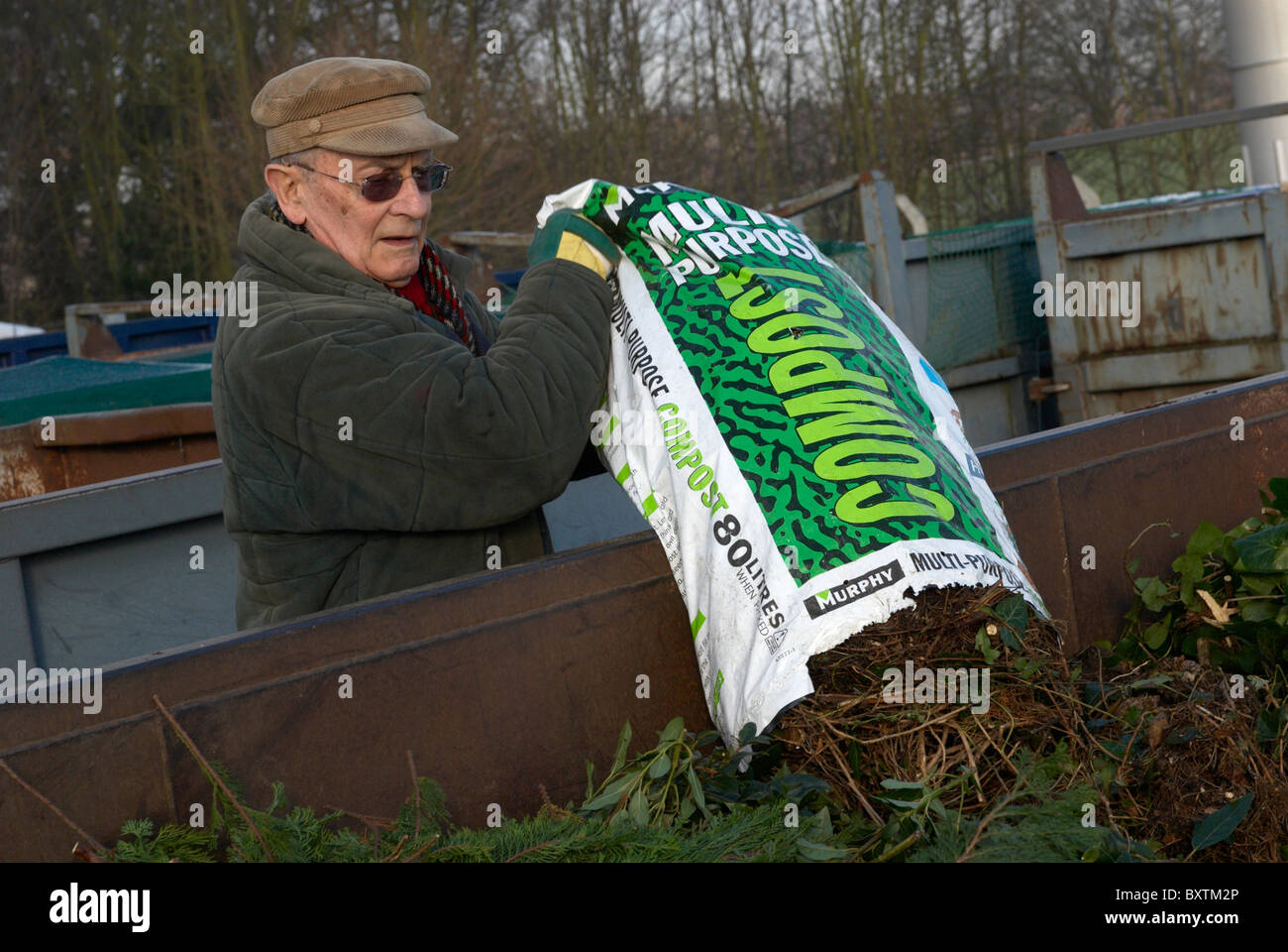 Elderly Man recycling garden waste UK Stock Photo - Alamy