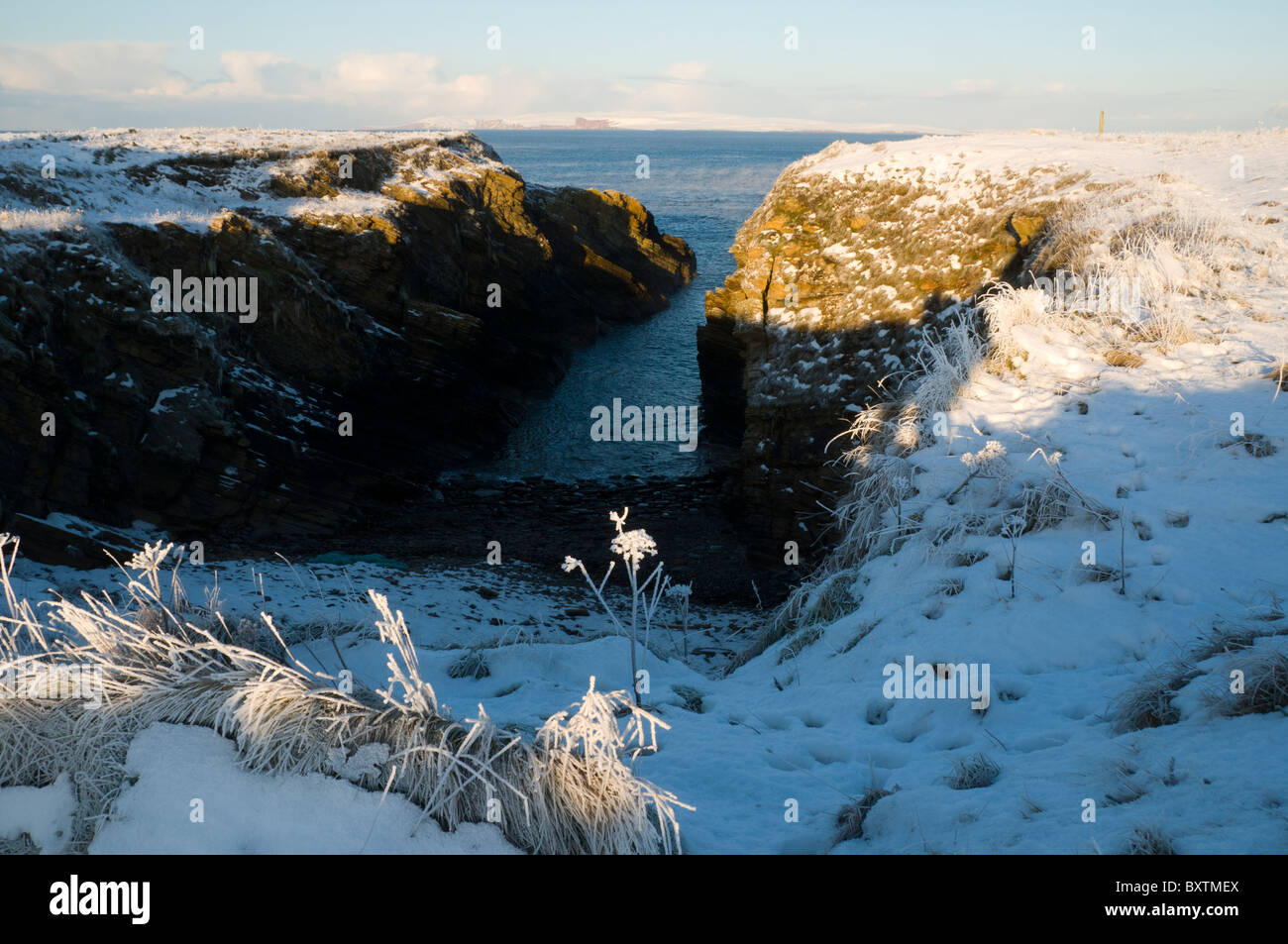 The hills of Hoy, Orkney, in winter, over the Pentland Firth. From a ...