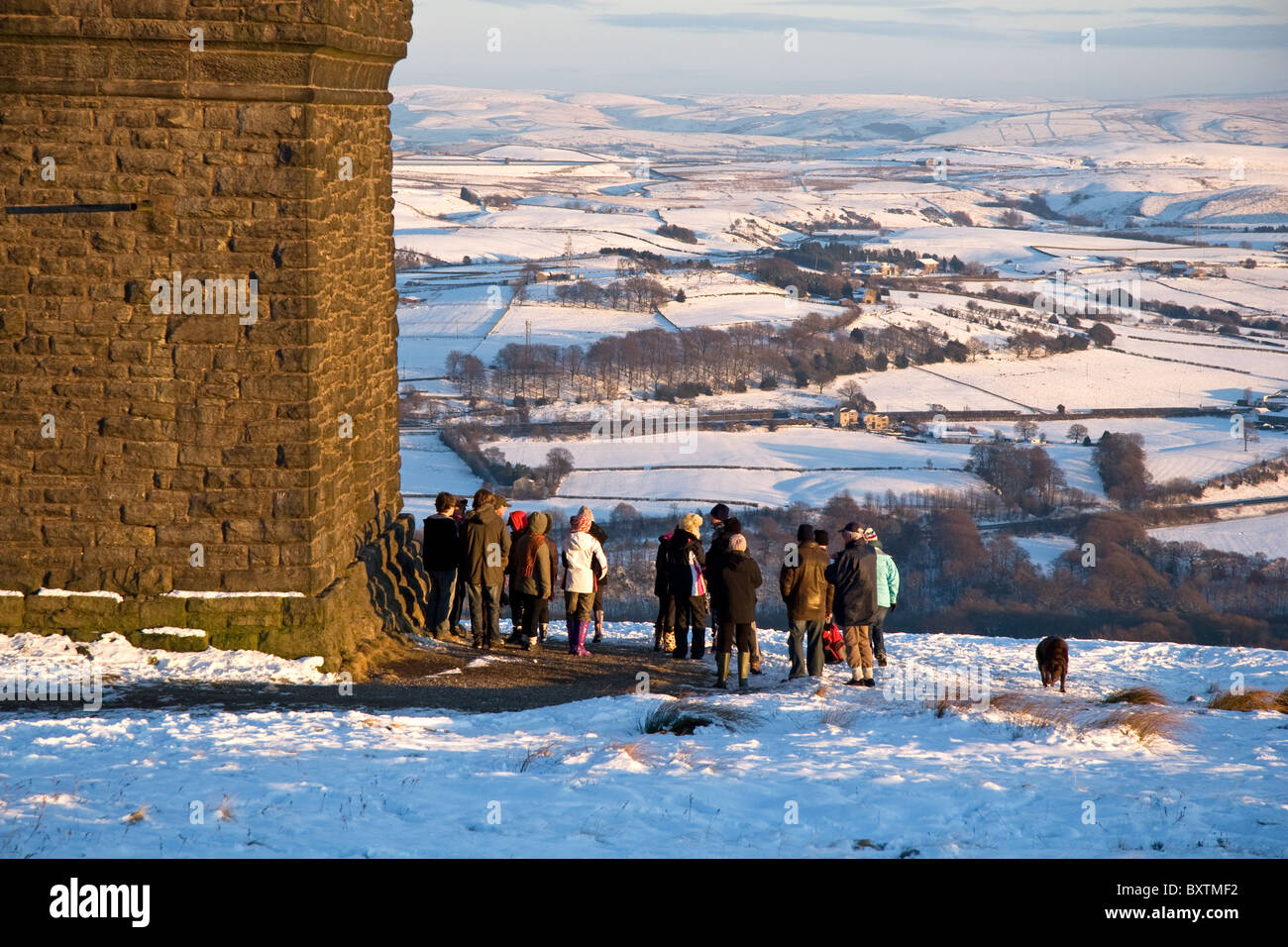 Walkers at the Peel Tower, Holcombe Hill, above Ramsbottom, Lancashire ...