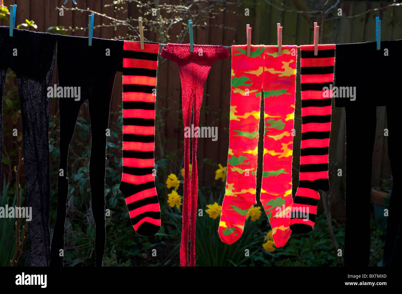 England, Socks On Washing Line Stock Photo - Alamy