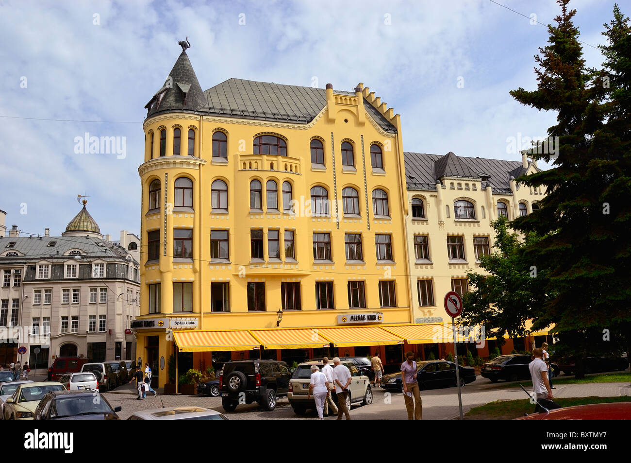 The yellow art nouveau building of The Cats so called because of two ...