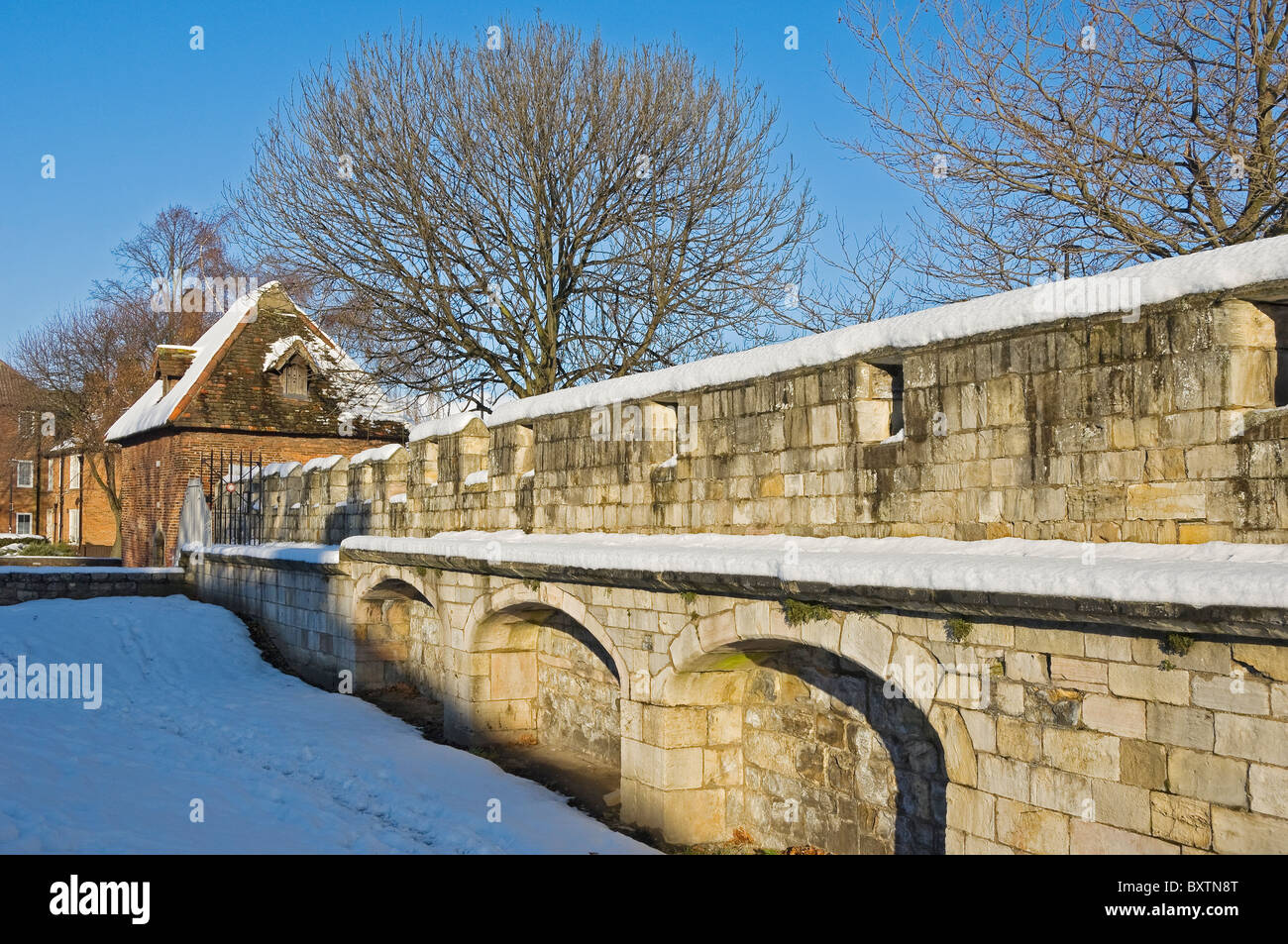 The Red Tower (built in 1490) and City Walls in winter snow York North ...